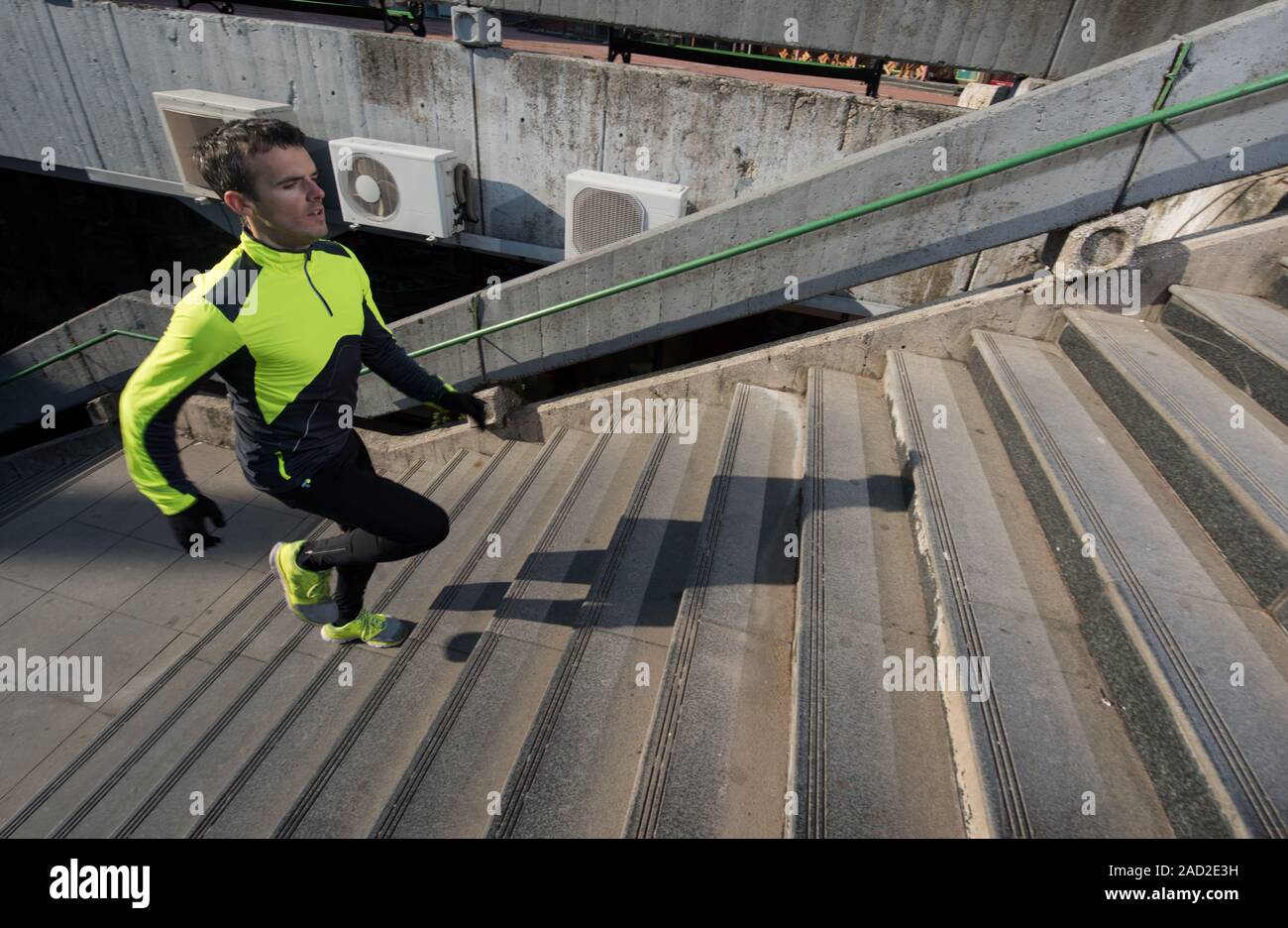 man jogging on steps Stock Photo - Alamy