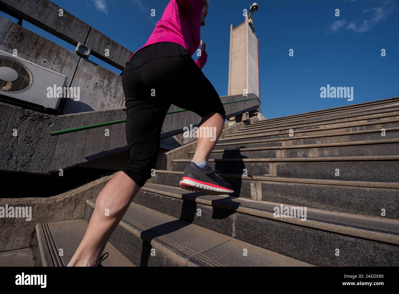 woman jogging on steps Stock Photo - Alamy