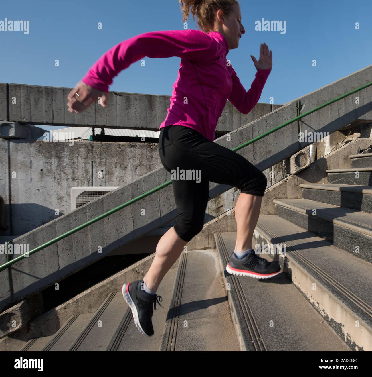 woman jogging on steps Stock Photo - Alamy