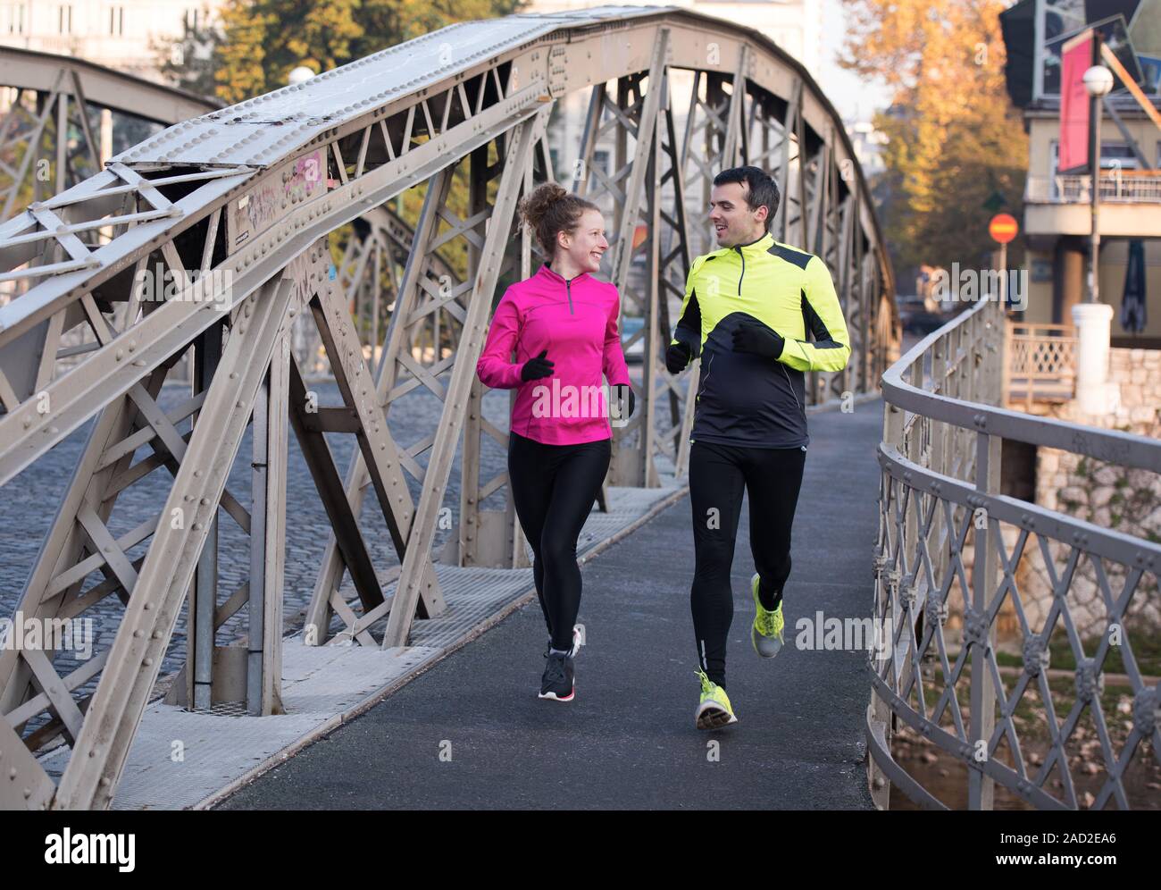 young couple jogging Stock Photo - Alamy