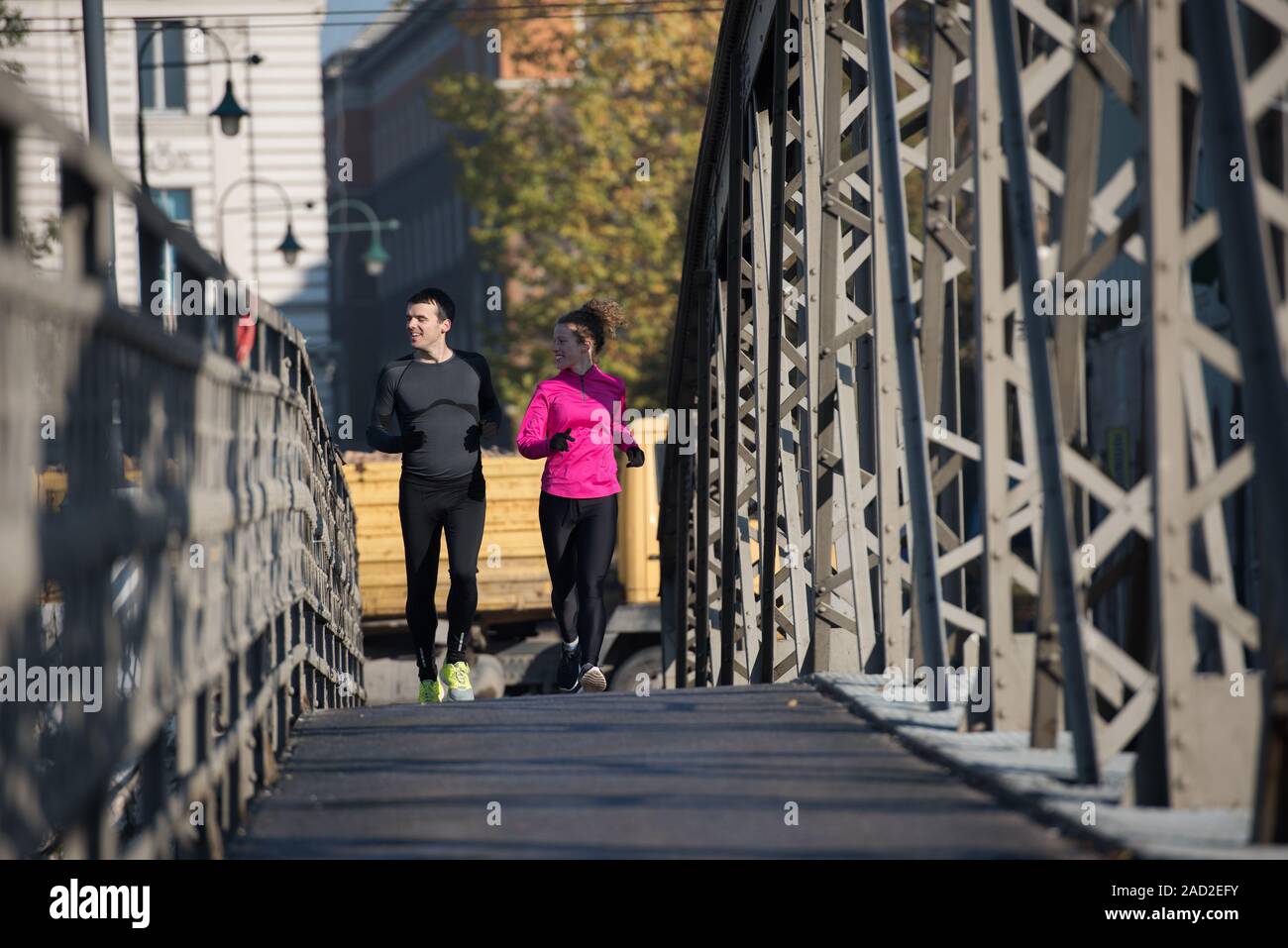 young couple jogging Stock Photo - Alamy