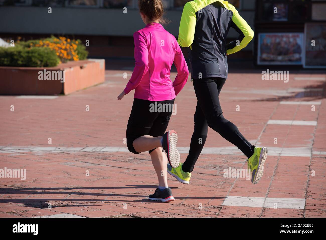 young couple jogging Stock Photo - Alamy