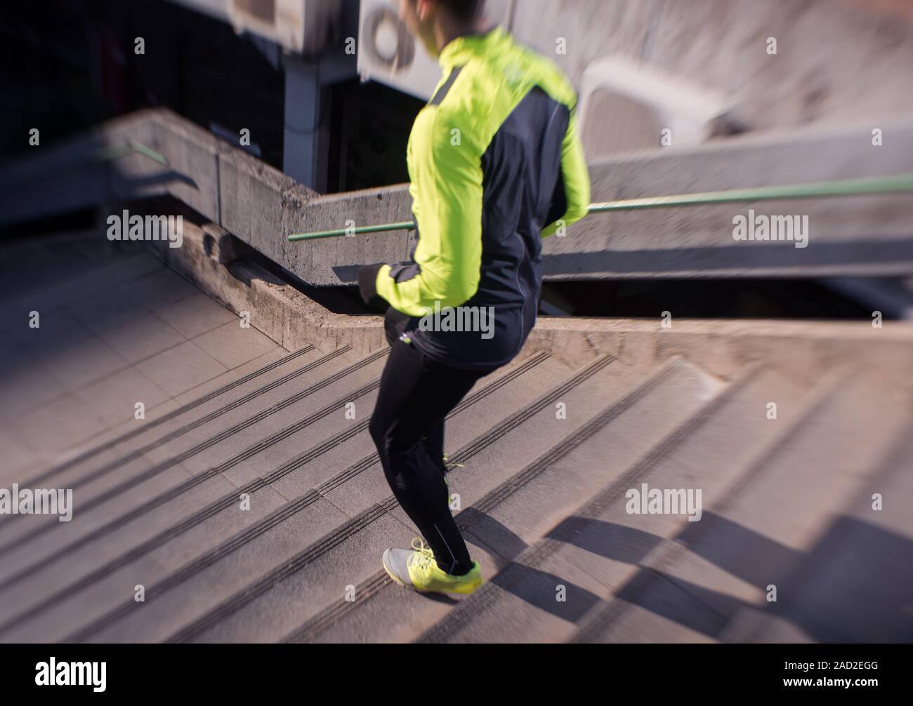 man jogging on steps Stock Photo - Alamy