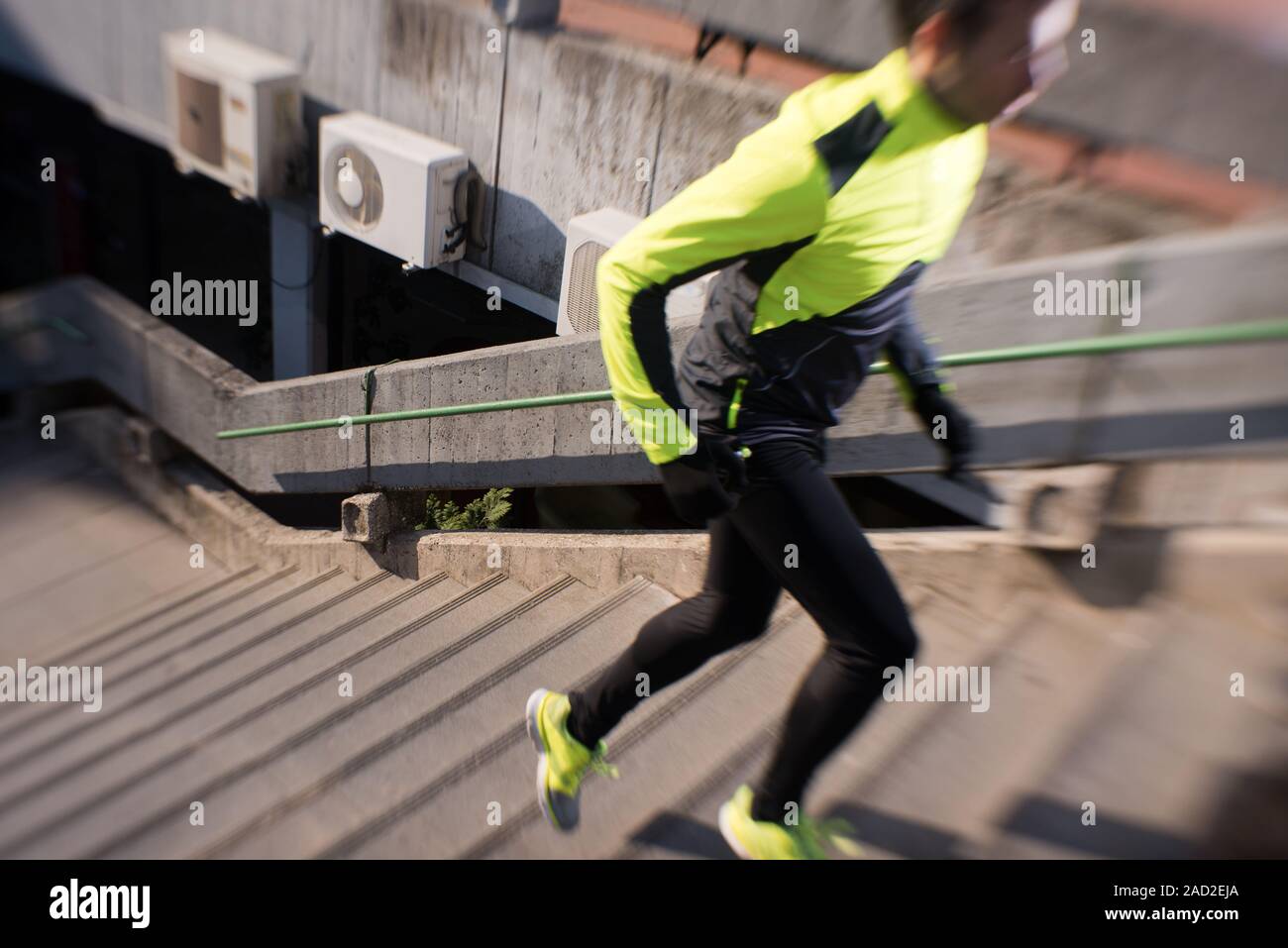 man jogging on steps Stock Photo - Alamy