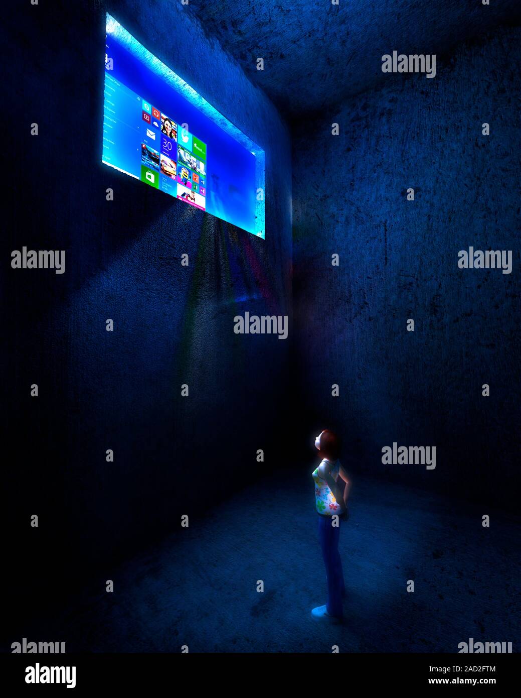 Computer isolation. Conceptual image of a woman alone in a darkened ...