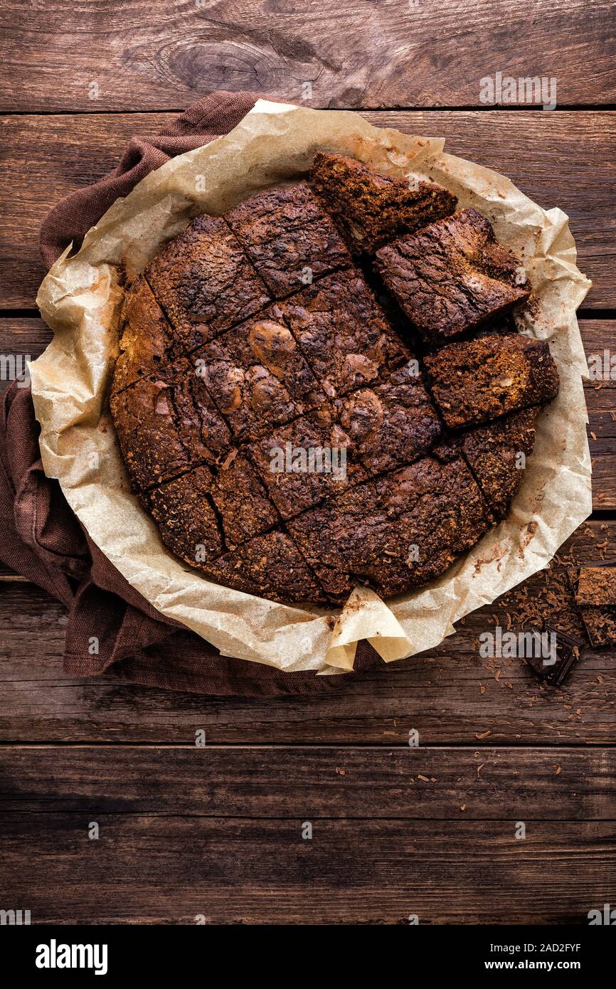 homemade chocolate brownie on dark wooden background, top view Stock ...