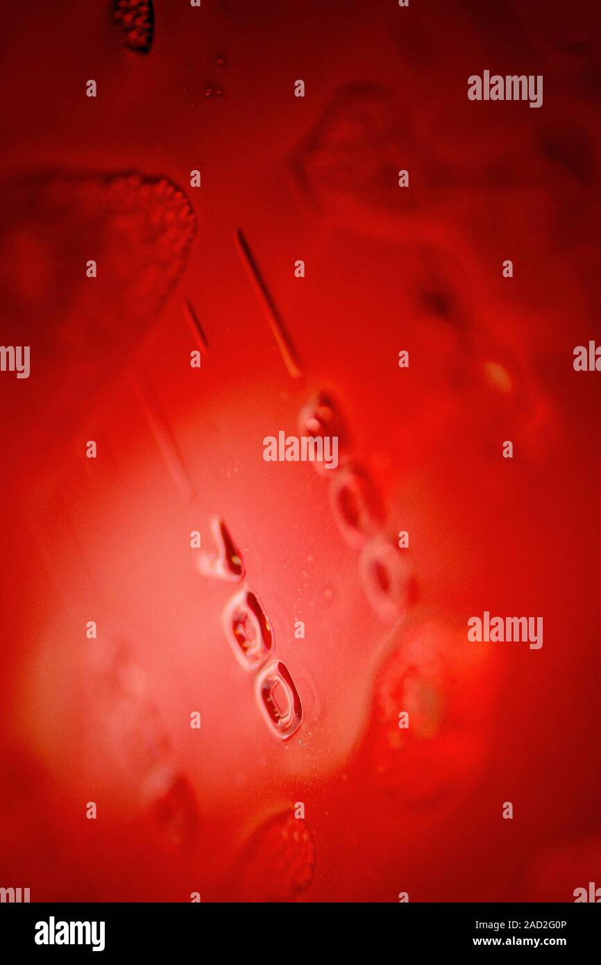 Measuring liquid volumes. Close-up of volume markings on a piece of ...