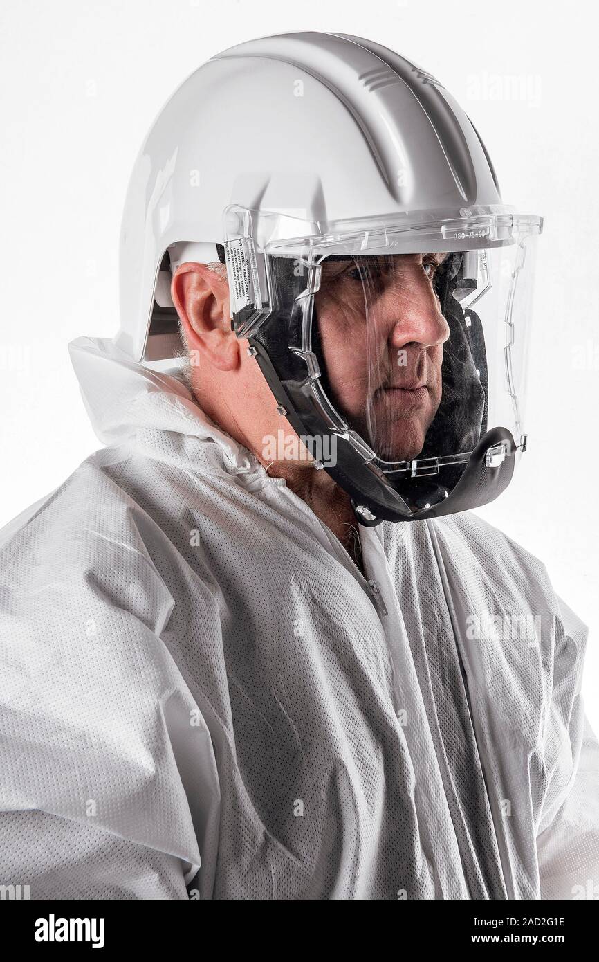 Protective safety clothing. Worker wearing a range of protective ...
