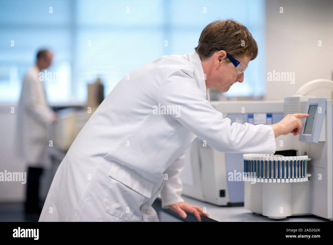 Gas chromatography analysis. Researcher with a gas chromatography ...