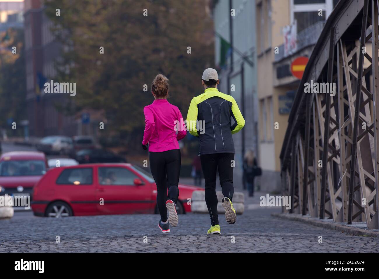 young couple jogging Stock Photo - Alamy