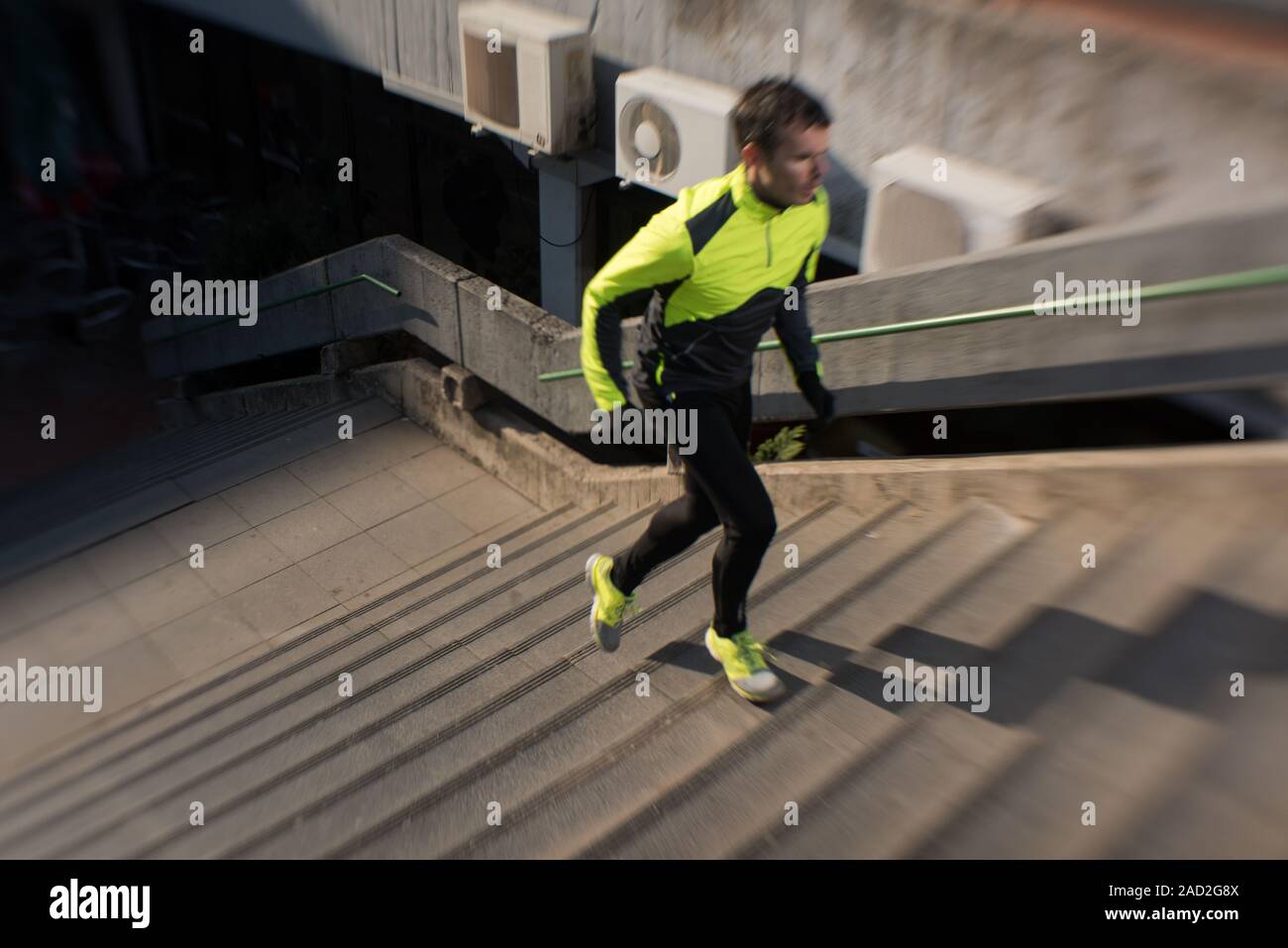 man jogging on steps Stock Photo - Alamy