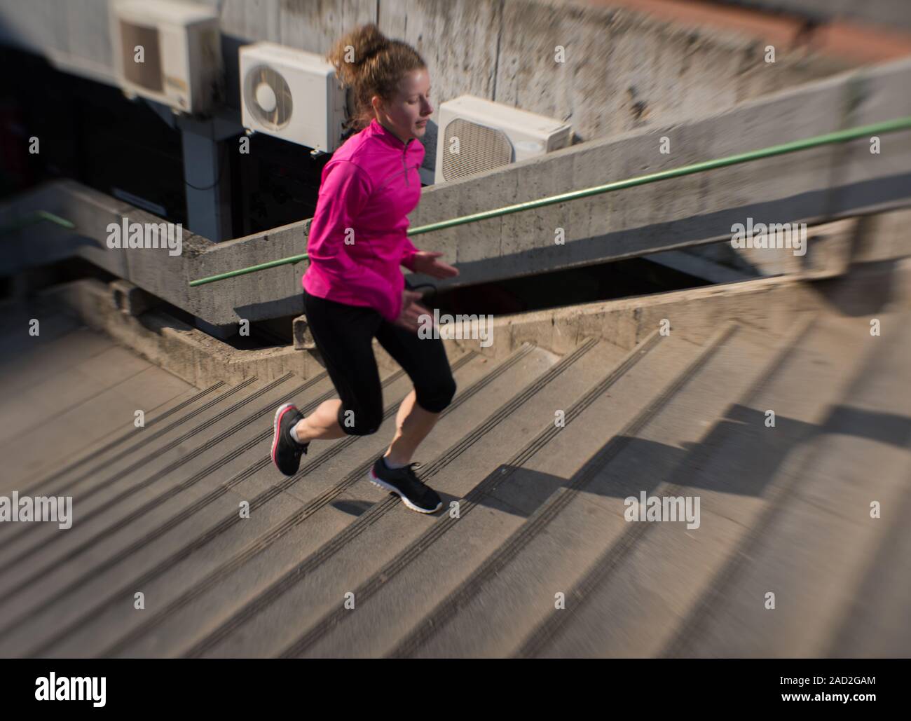 woman jogging on steps Stock Photo - Alamy
