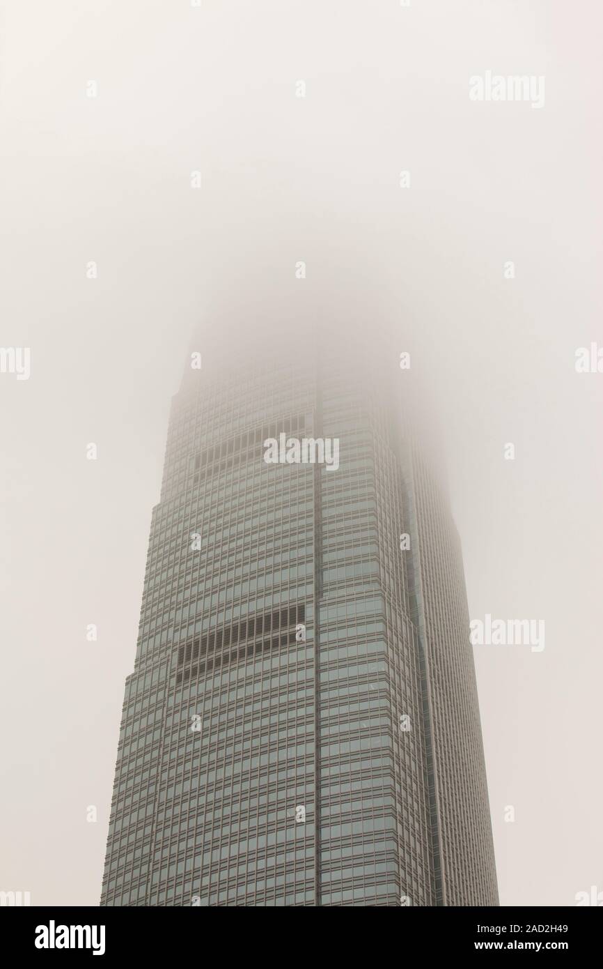 An office block in Hong Kong, China, shrouded in cloud Stock Photo - Alamy