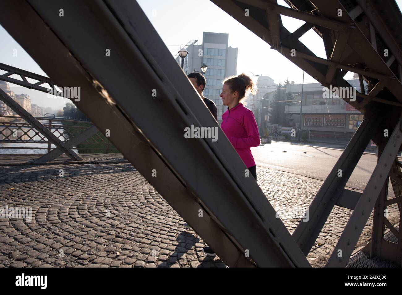 young couple jogging Stock Photo - Alamy
