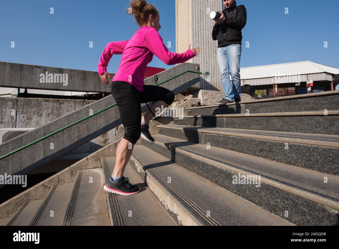woman jogging on steps Stock Photo - Alamy