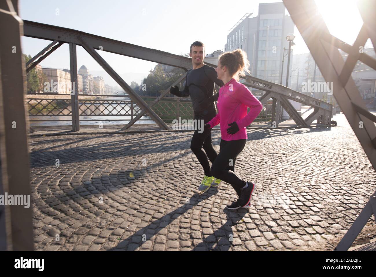 young couple jogging Stock Photo - Alamy