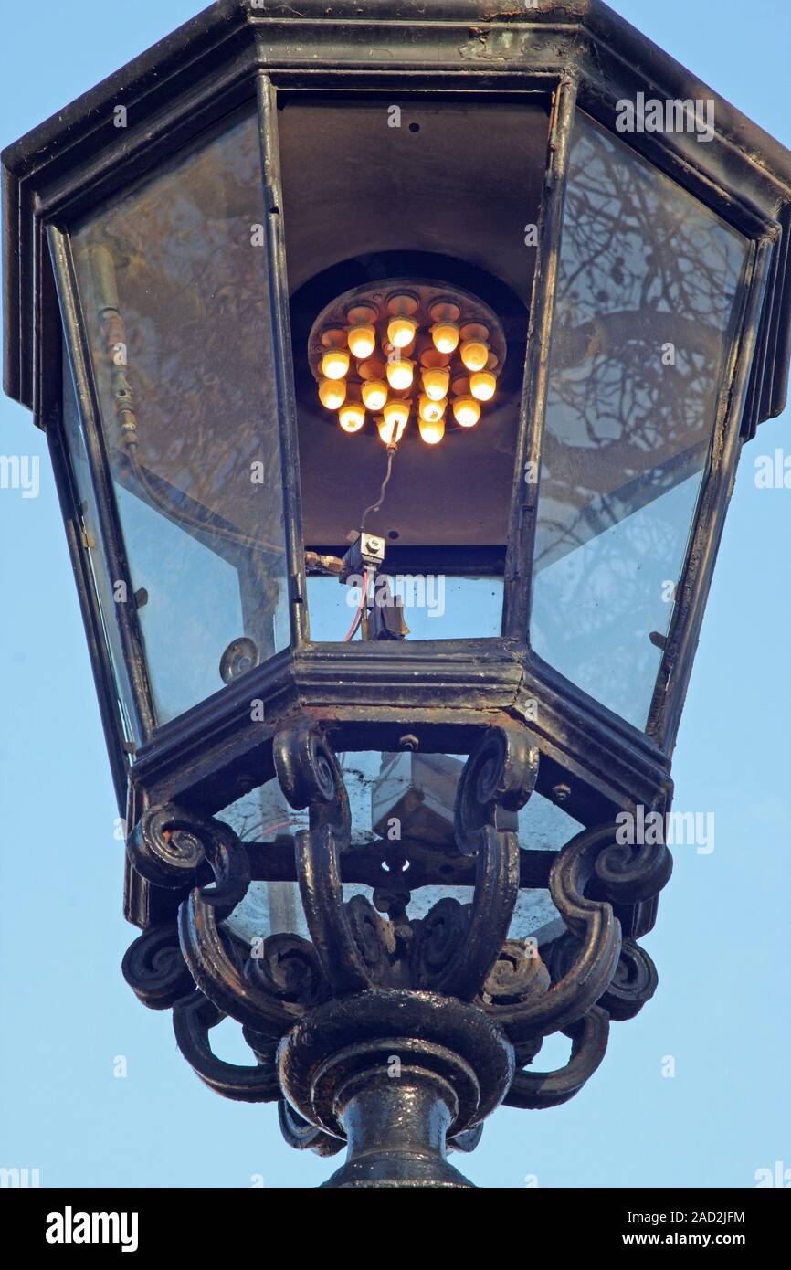 Gas street lighting. Close-up of a gas-powered street lamp. This ...