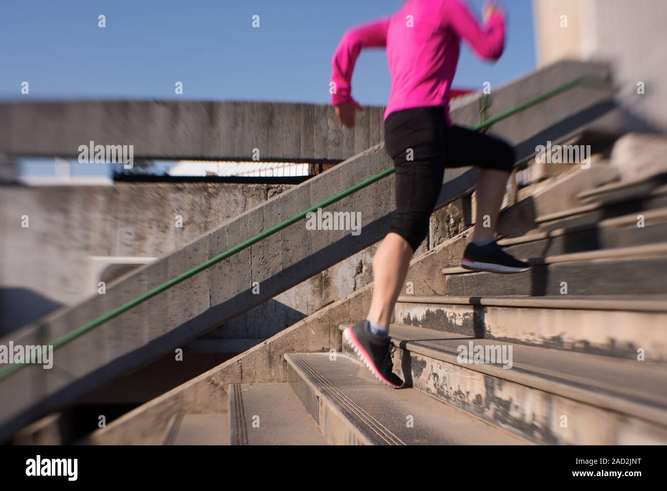 woman jogging on steps Stock Photo - Alamy