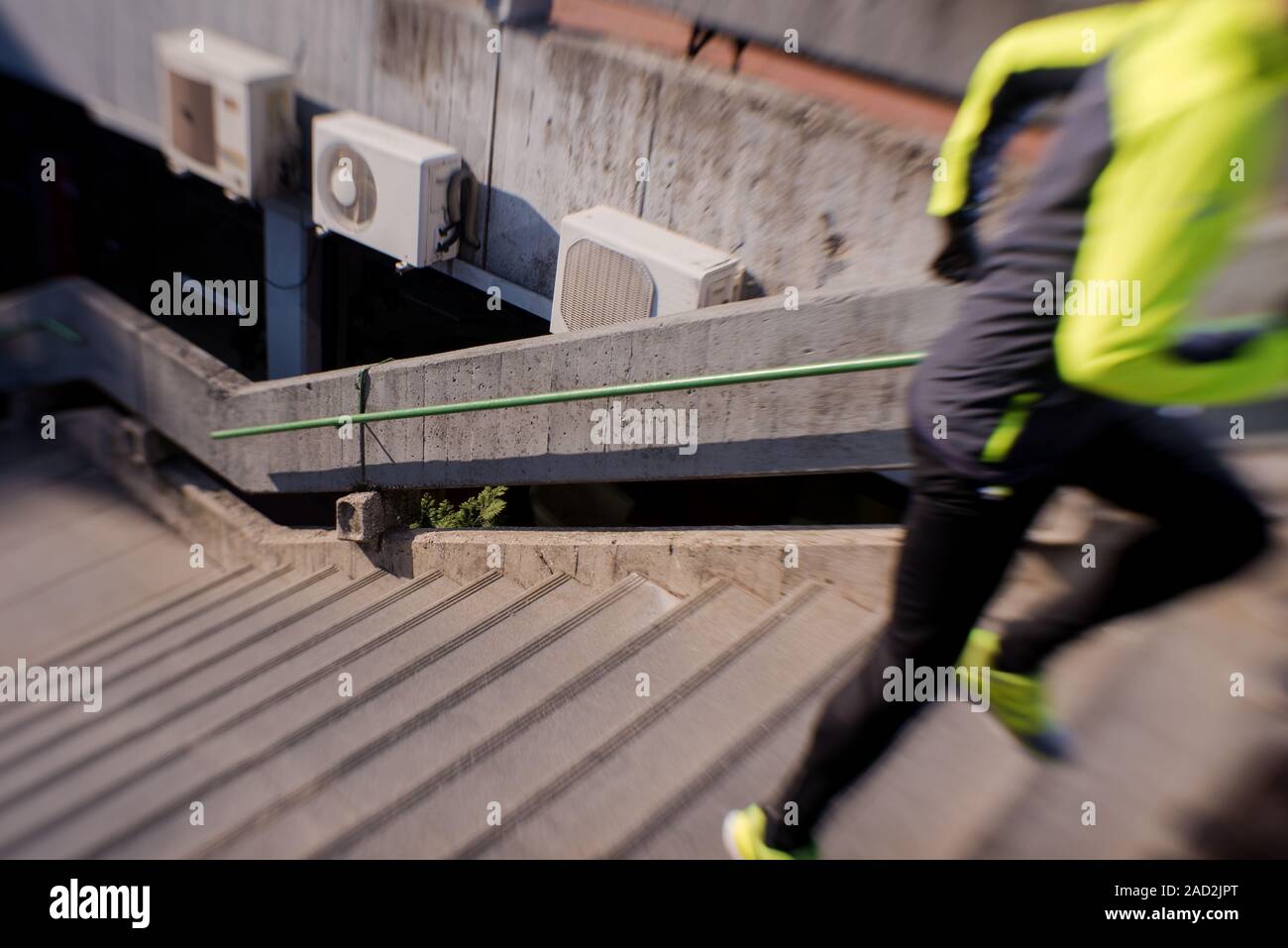 man jogging on steps Stock Photo - Alamy