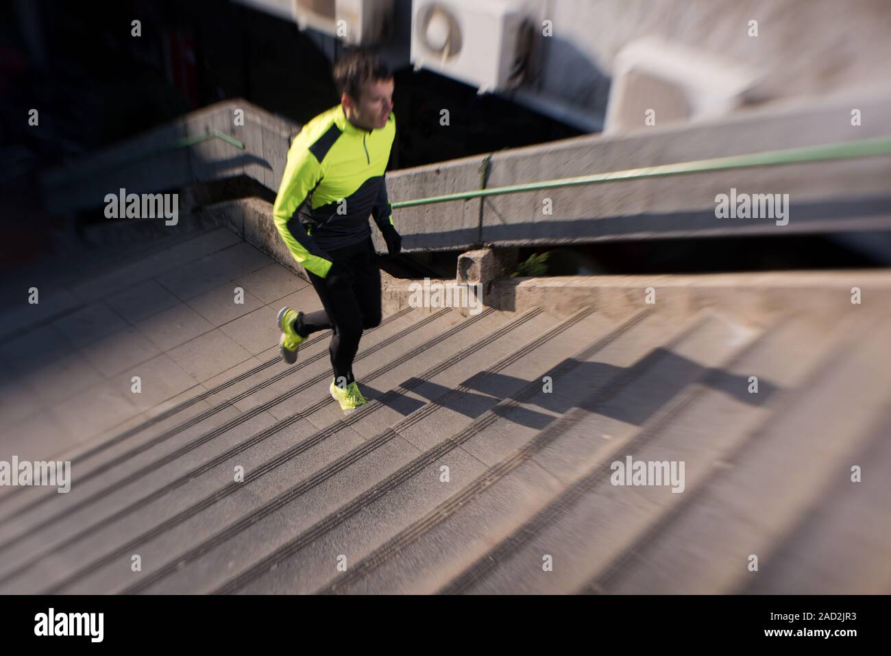 man jogging on steps Stock Photo - Alamy