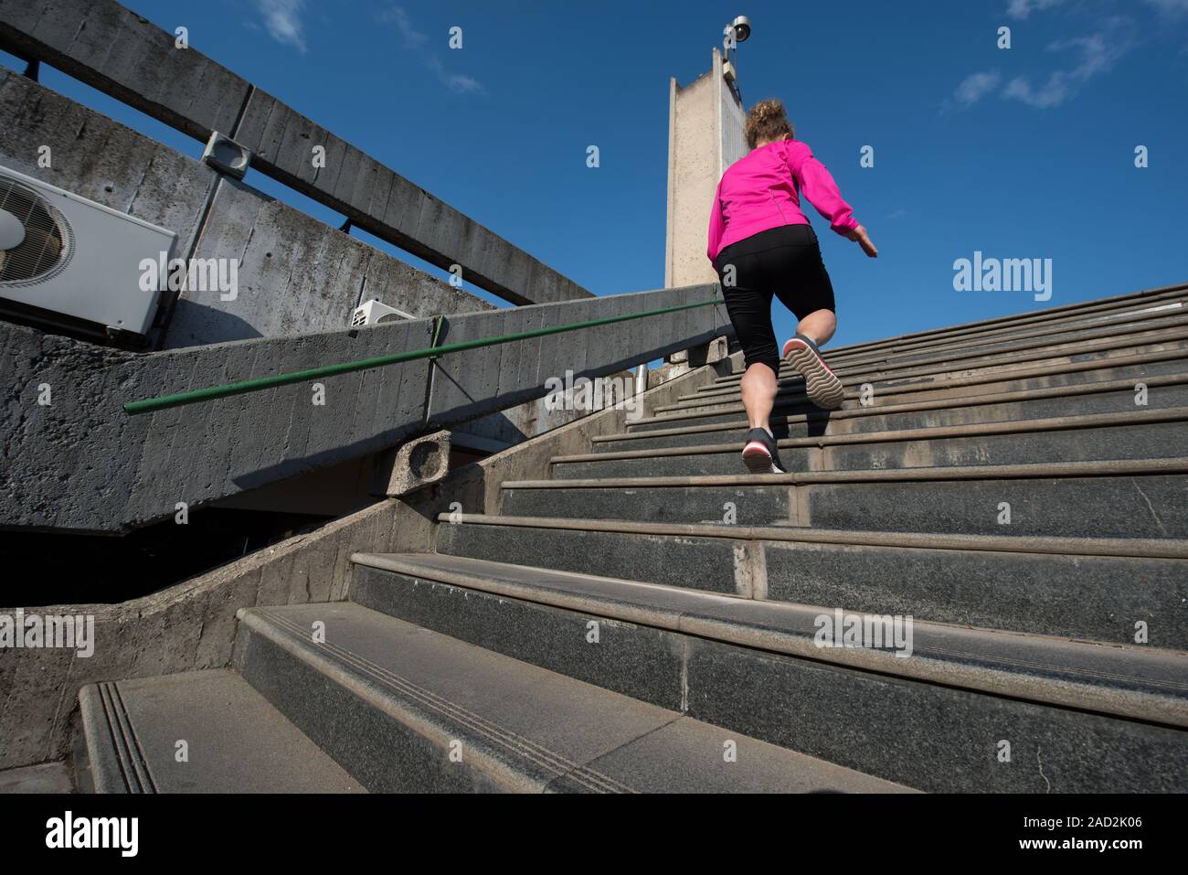 woman jogging on steps Stock Photo - Alamy