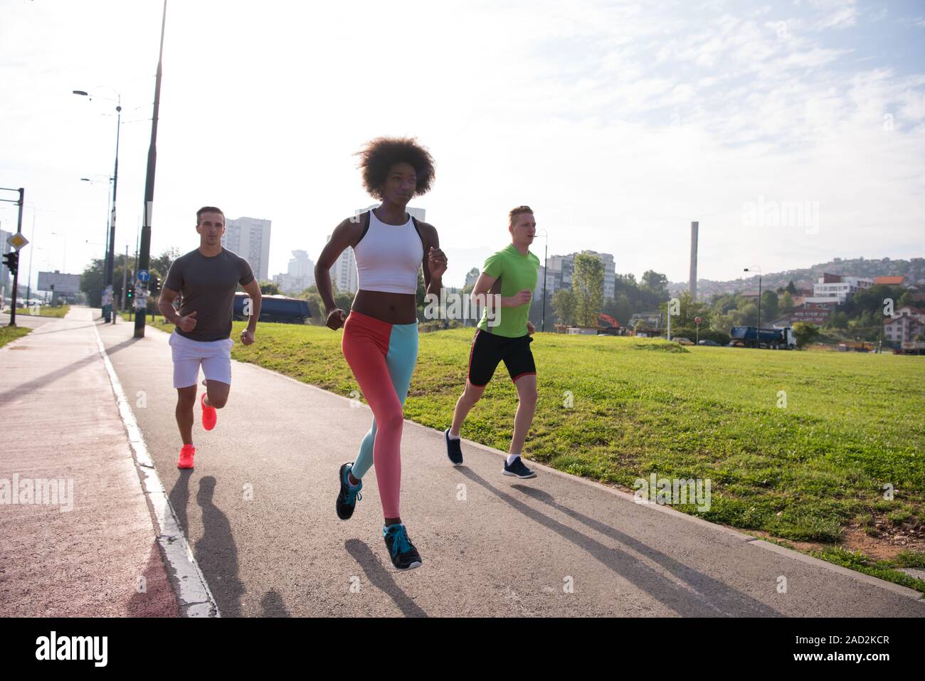 multiethnic group of people on the jogging Stock Photo - Alamy