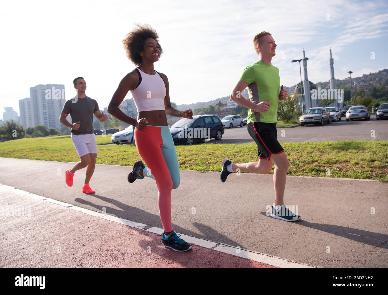 multiethnic group of people on the jogging Stock Photo - Alamy