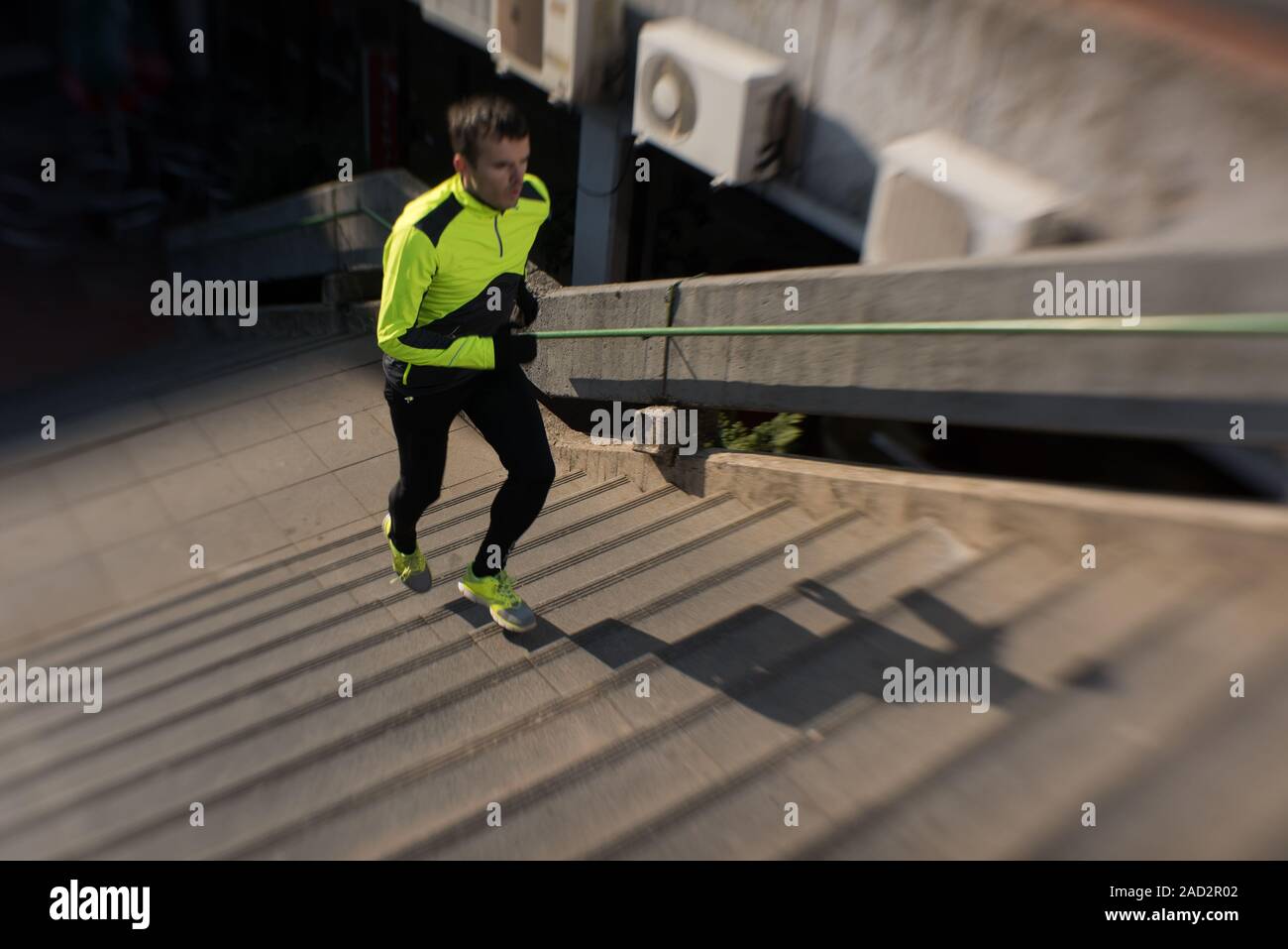 man jogging on steps Stock Photo - Alamy