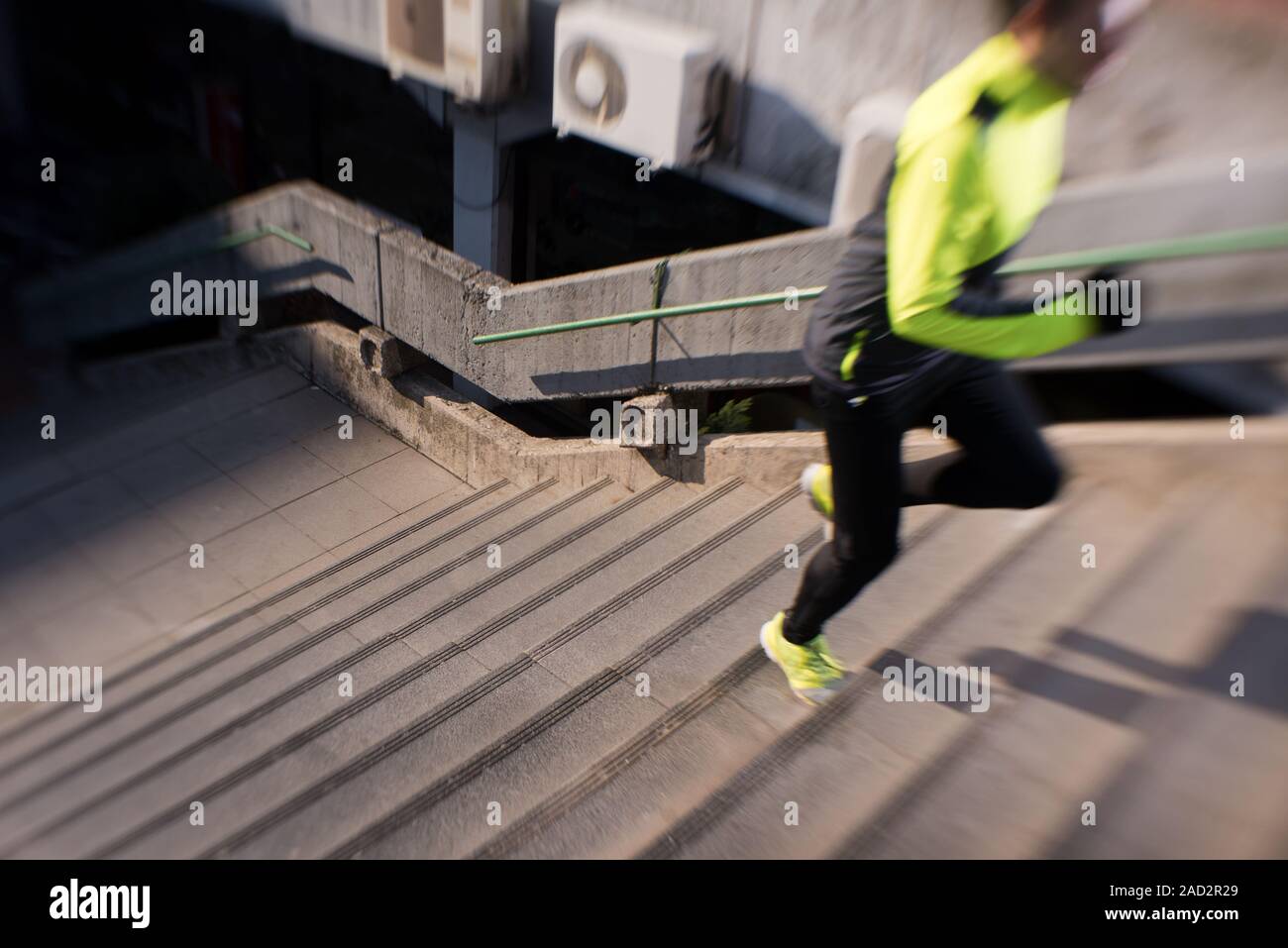 man jogging on steps Stock Photo - Alamy