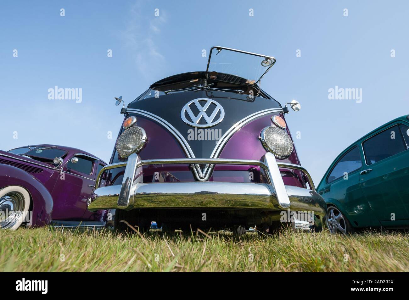 Fully restored purple split-screen Volkswagen Camper van at a meeting ...