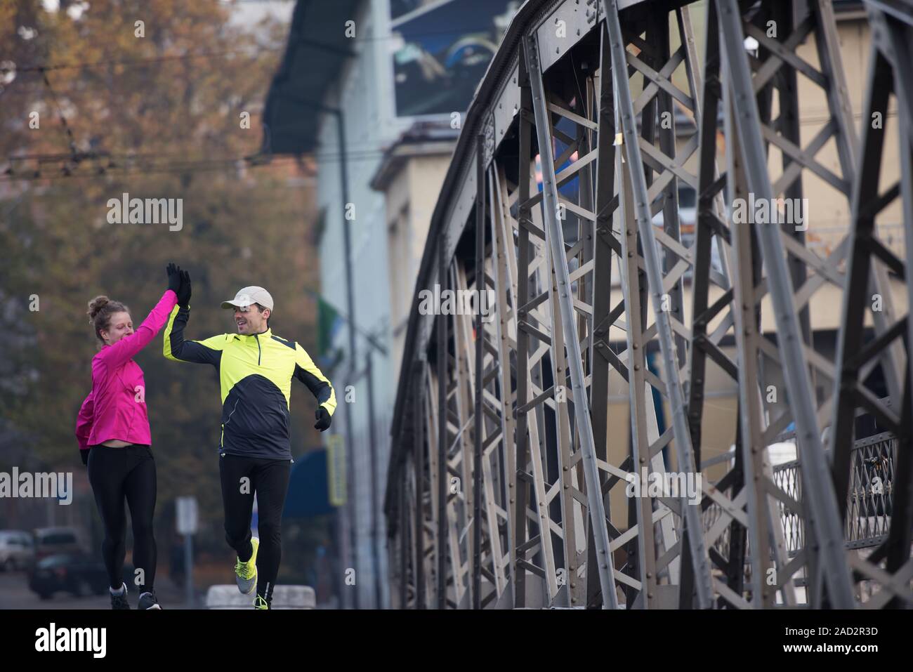 young couple jogging Stock Photo - Alamy