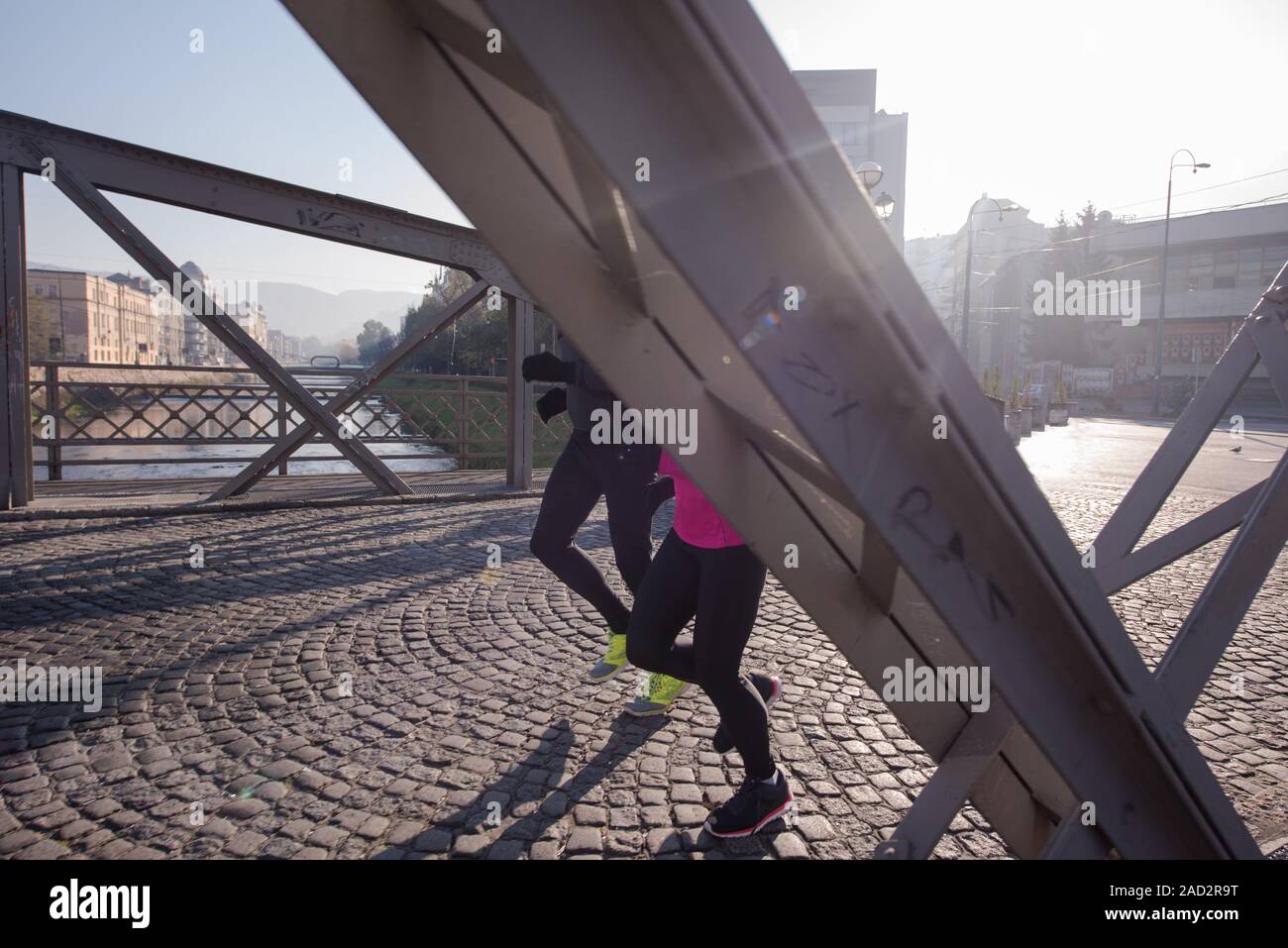 young couple jogging Stock Photo - Alamy