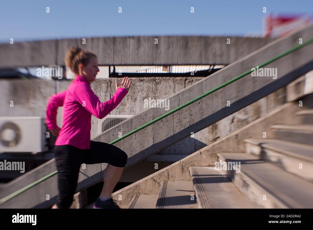 woman stretching before morning jogging Stock Photo - Alamy