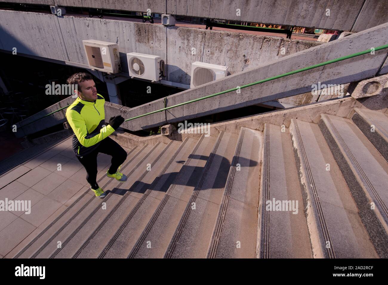 man jogging on steps Stock Photo - Alamy