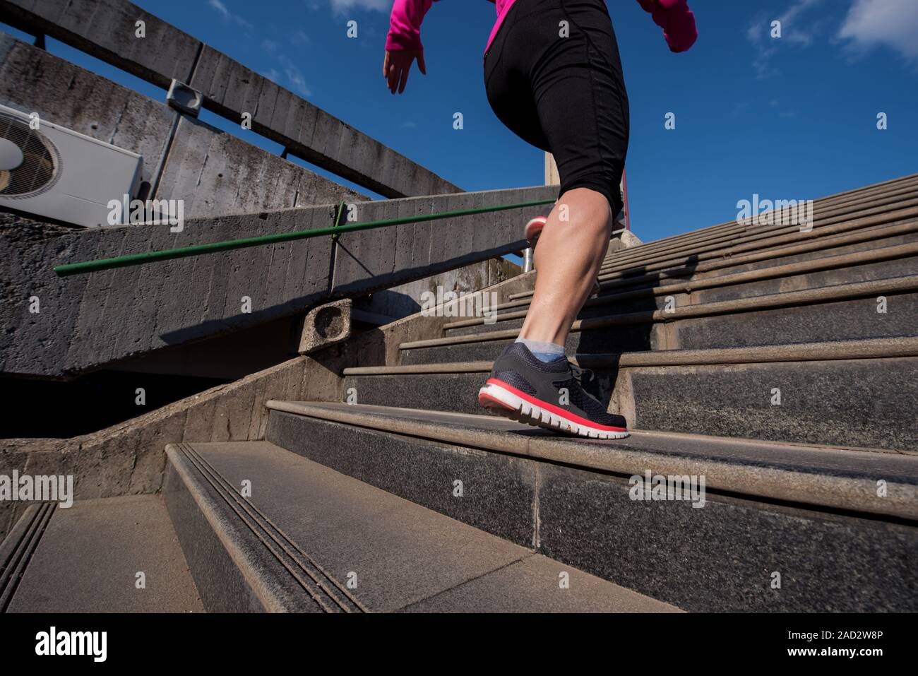 woman jogging on steps Stock Photo - Alamy