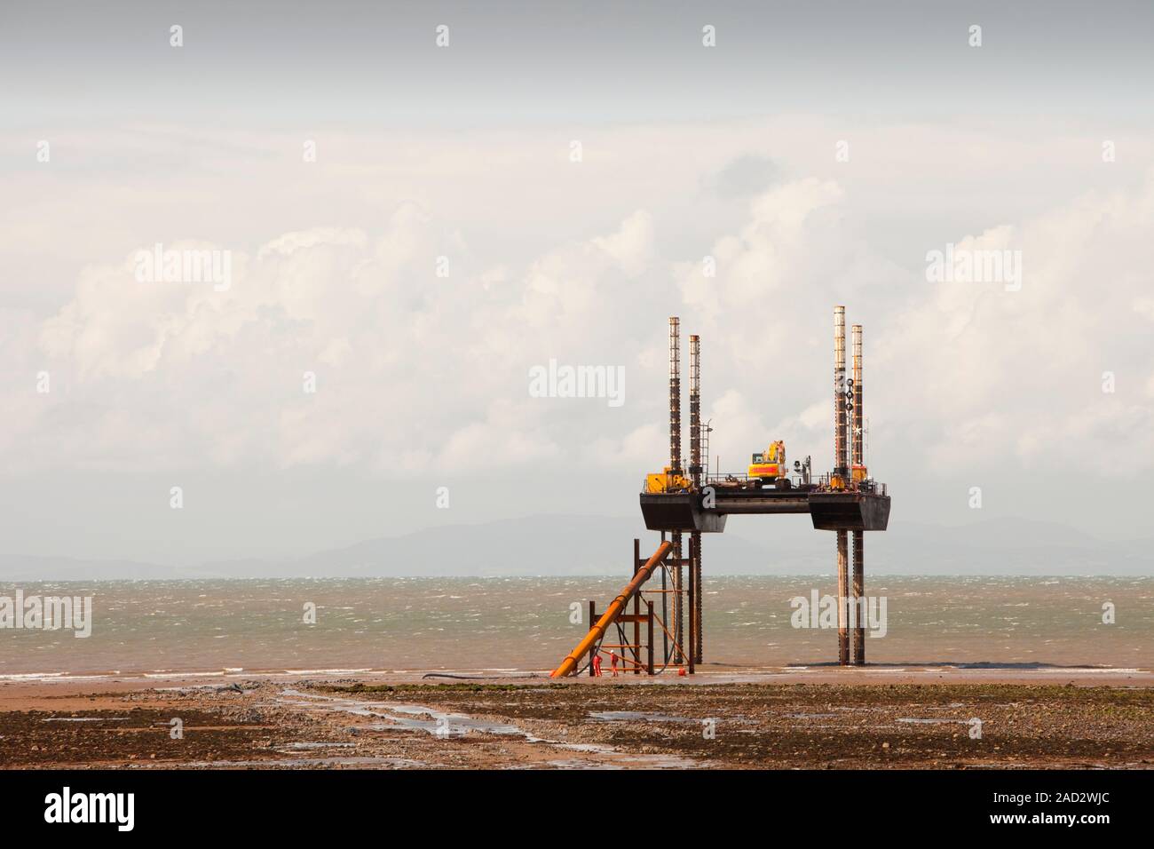 A jack up barge laying an electric cable from the Robin Rigg offshore ...