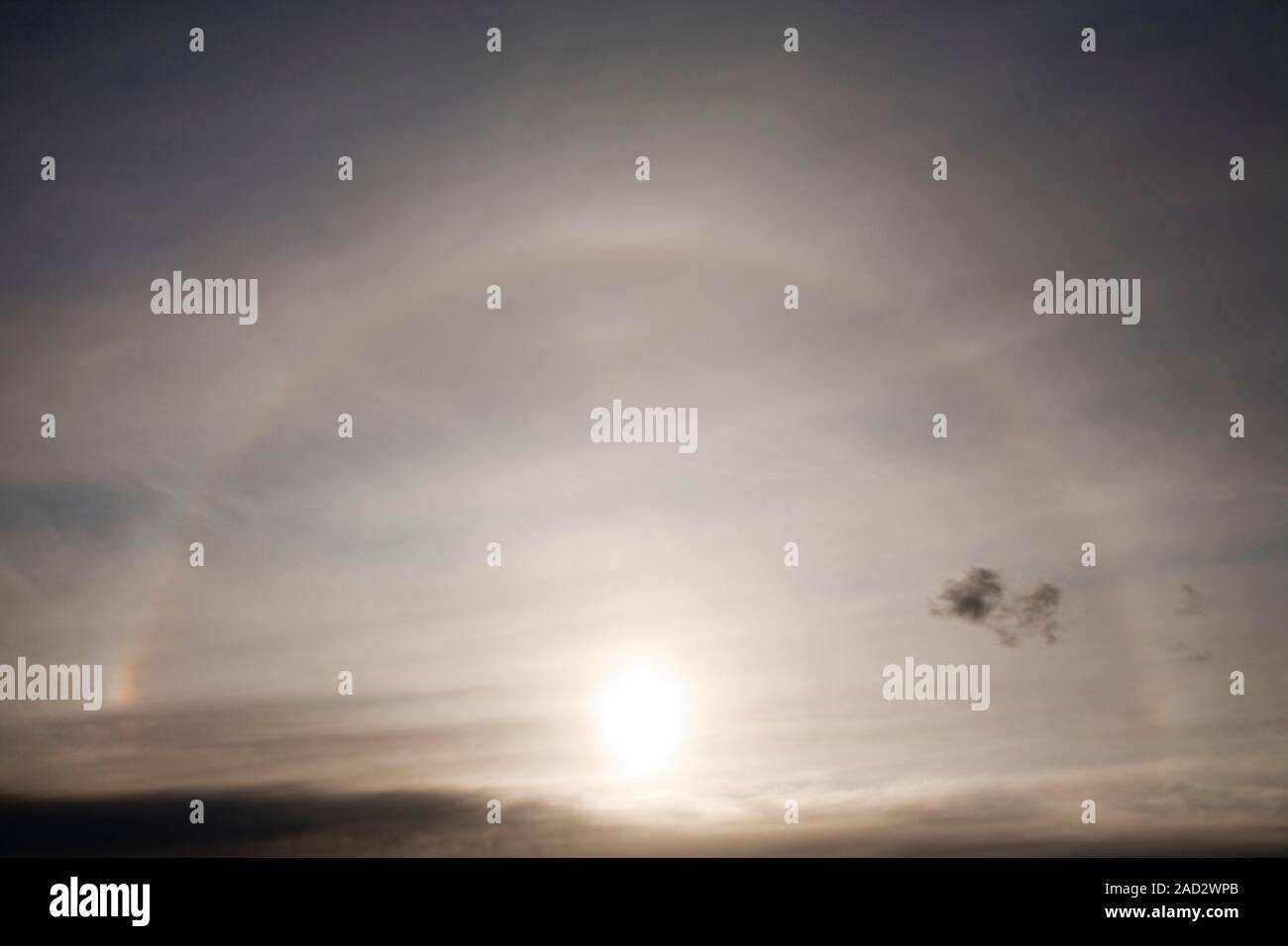 A rainbow around the sun caused by refraction from ice crystals in high ...