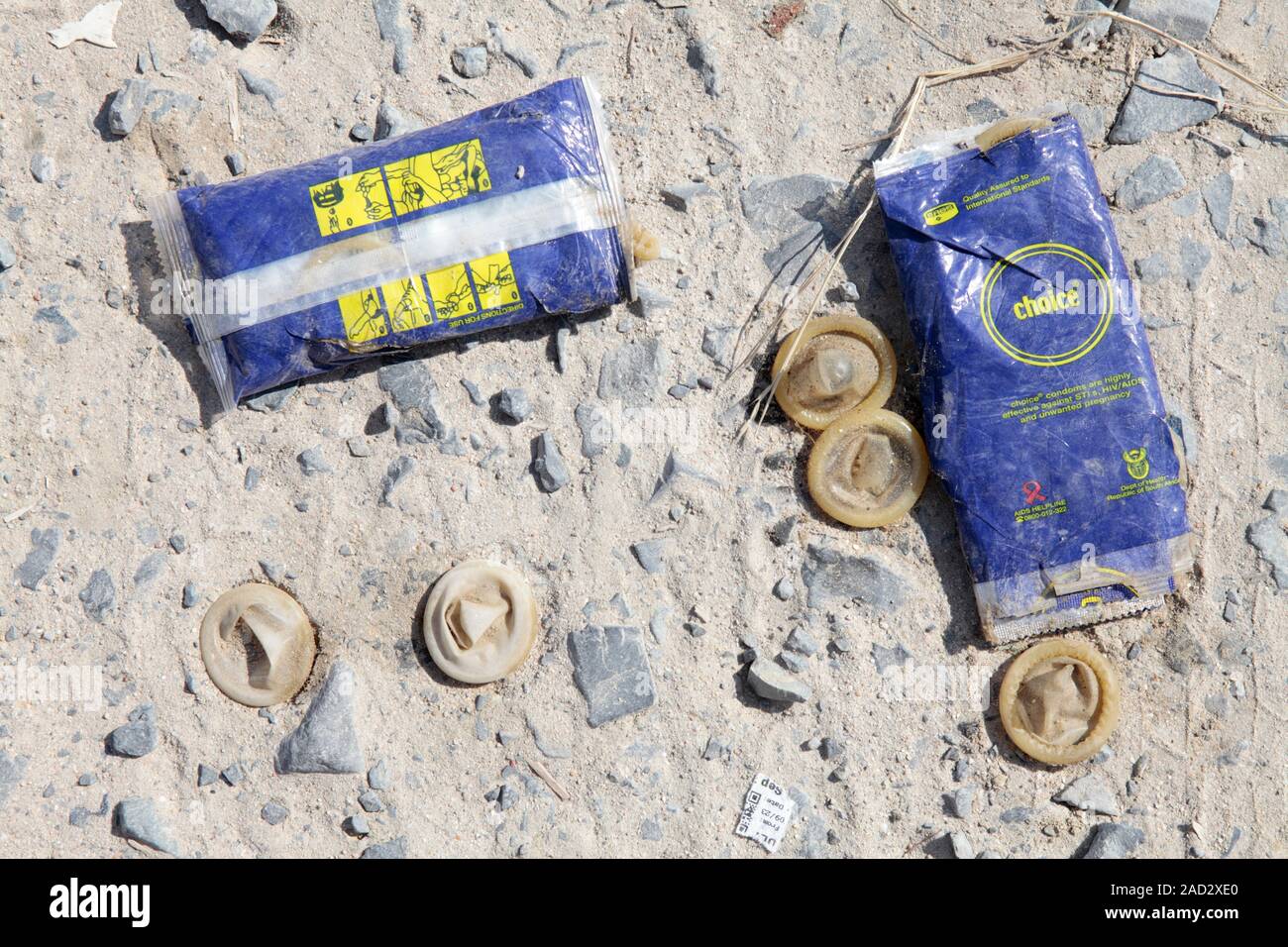 Discarded packets of government-issued condoms. Photographed in ...