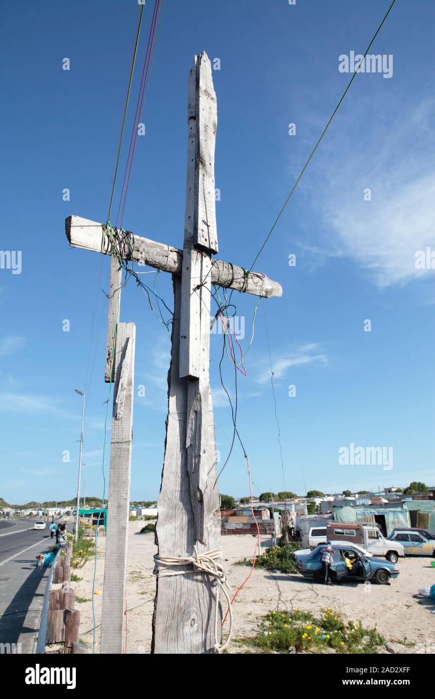 Township electricity supply. Makeshift poles and wiring provide an ...