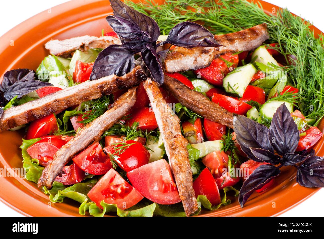 Strips of roast beef and sauteed vegetables. Salad Stock Photo - Alamy