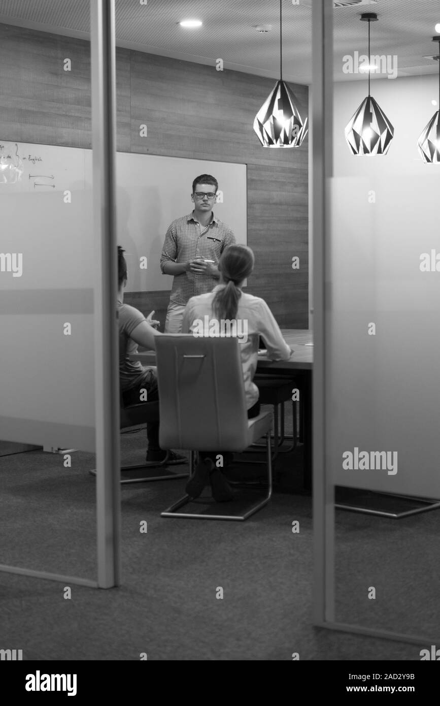 Teamwork meeting happy business Black and White Stock Photos & Images ...