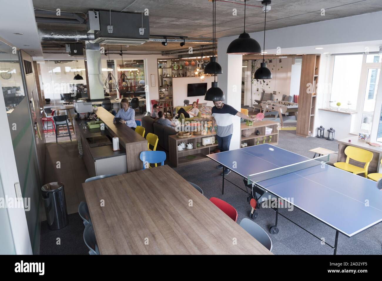 playing ping pong tennis at creative office space Stock Photo - Alamy