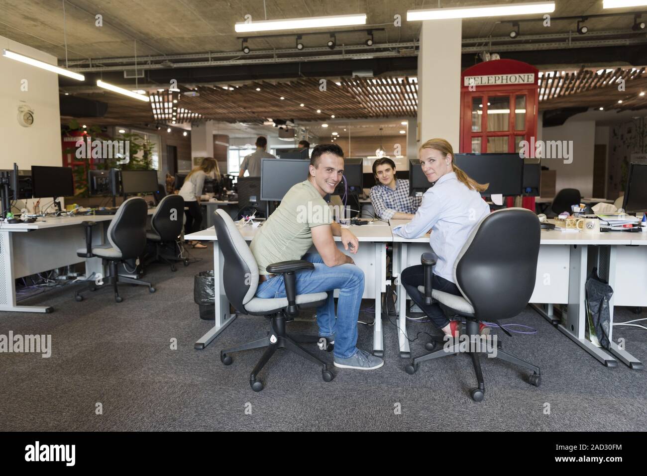 Colleagues getting together teamwork hi-res stock photography and ...