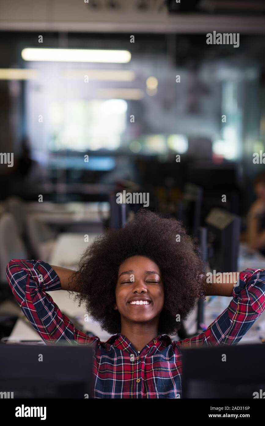 young black woman at her workplace in modern office African-American ...
