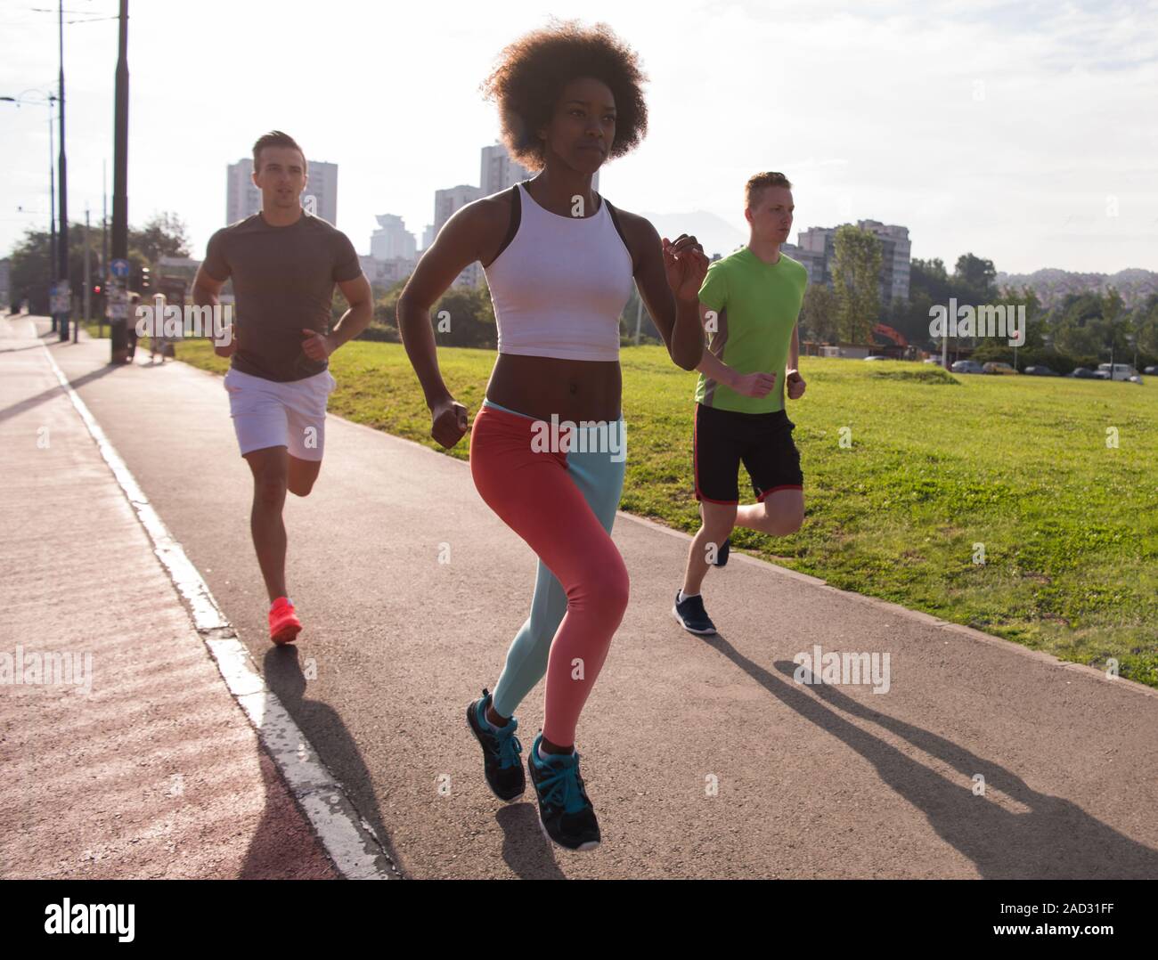multiethnic group of people on the jogging Stock Photo - Alamy