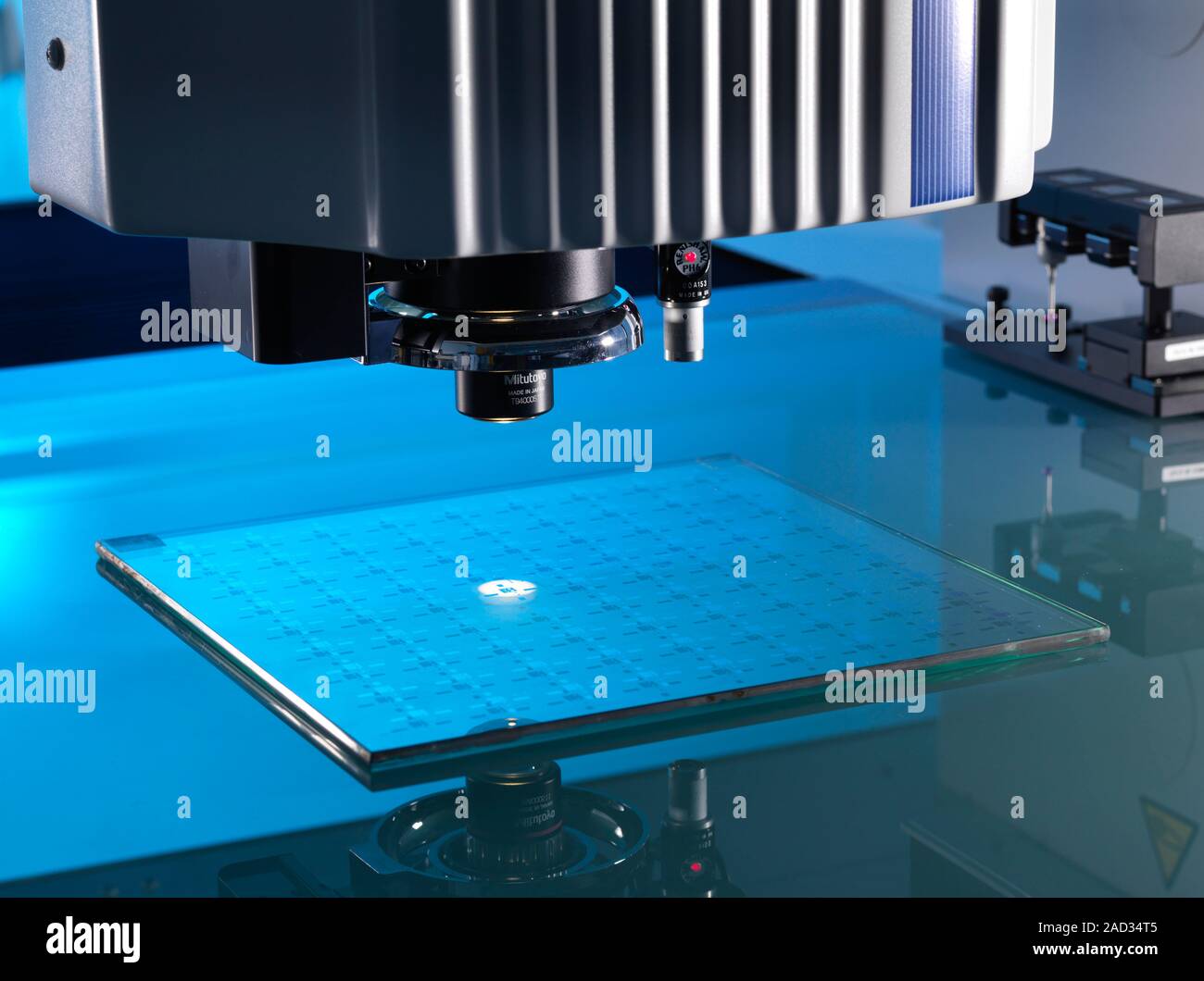 Co-ordinate measuring machine testing. Close-up of the probe head of a ...