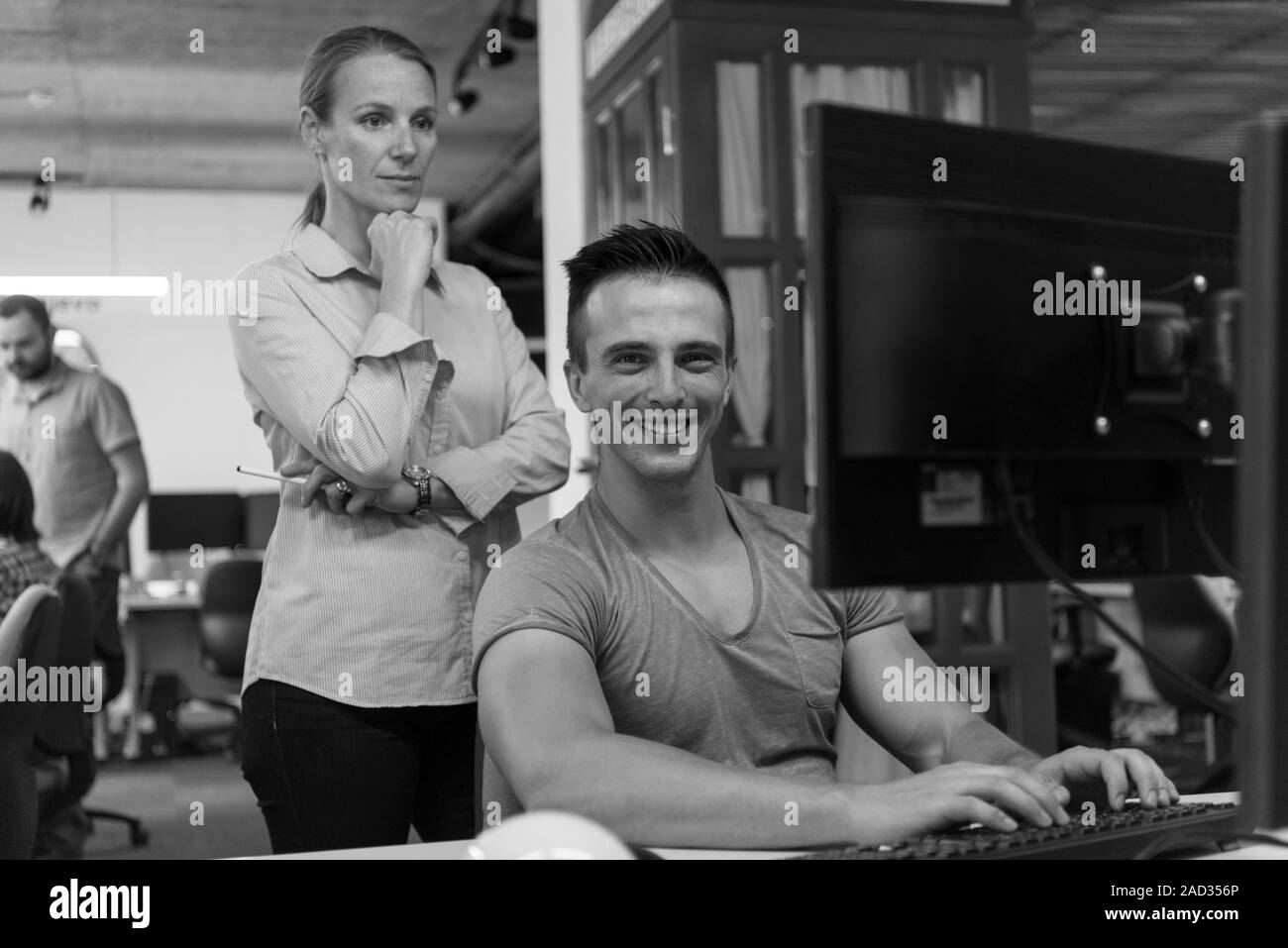 Business couple work laptop Black and White Stock Photos & Images - Alamy