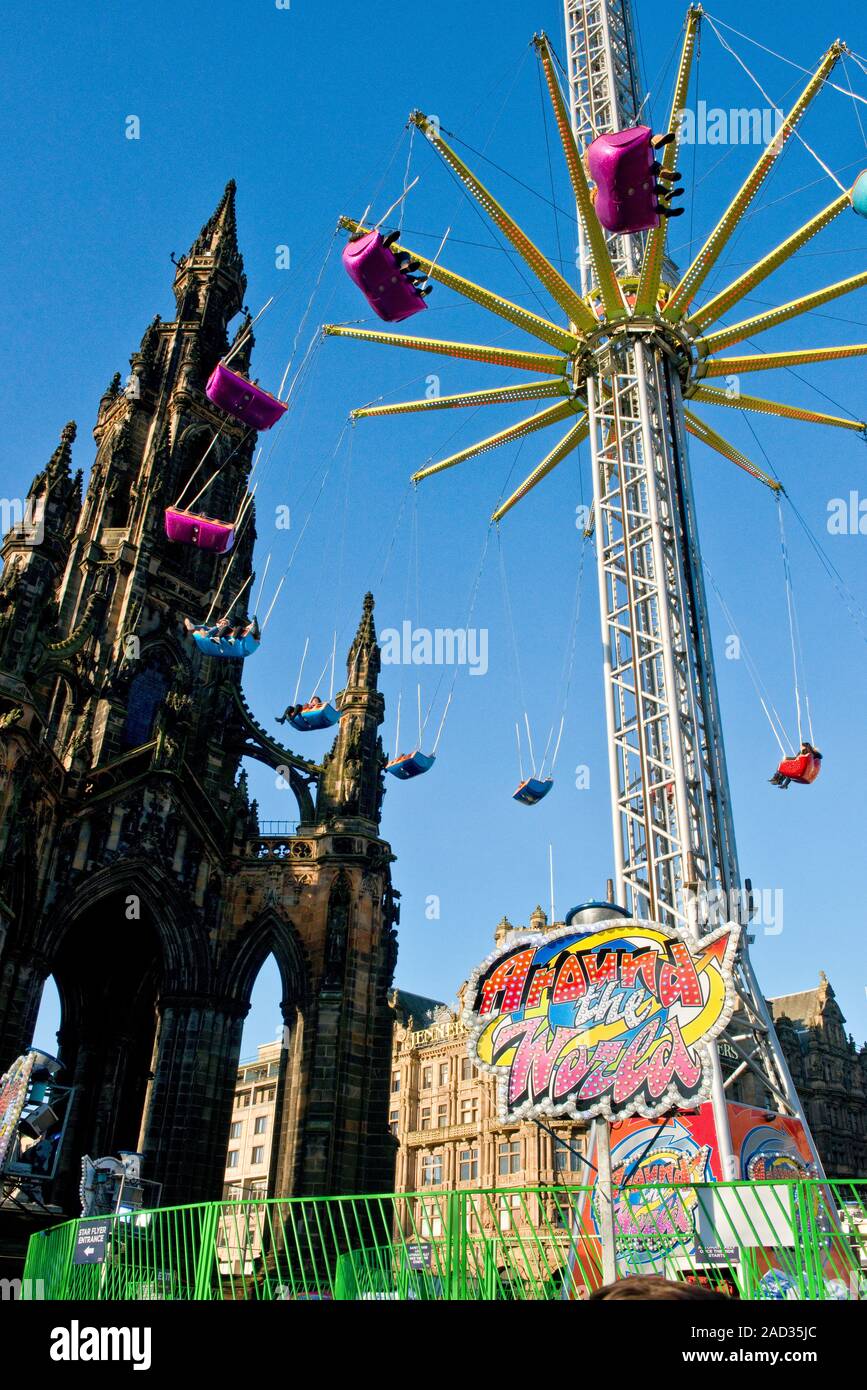 Walter Scott Monument and high Star Flyer fairground ride. Edinburgh ...