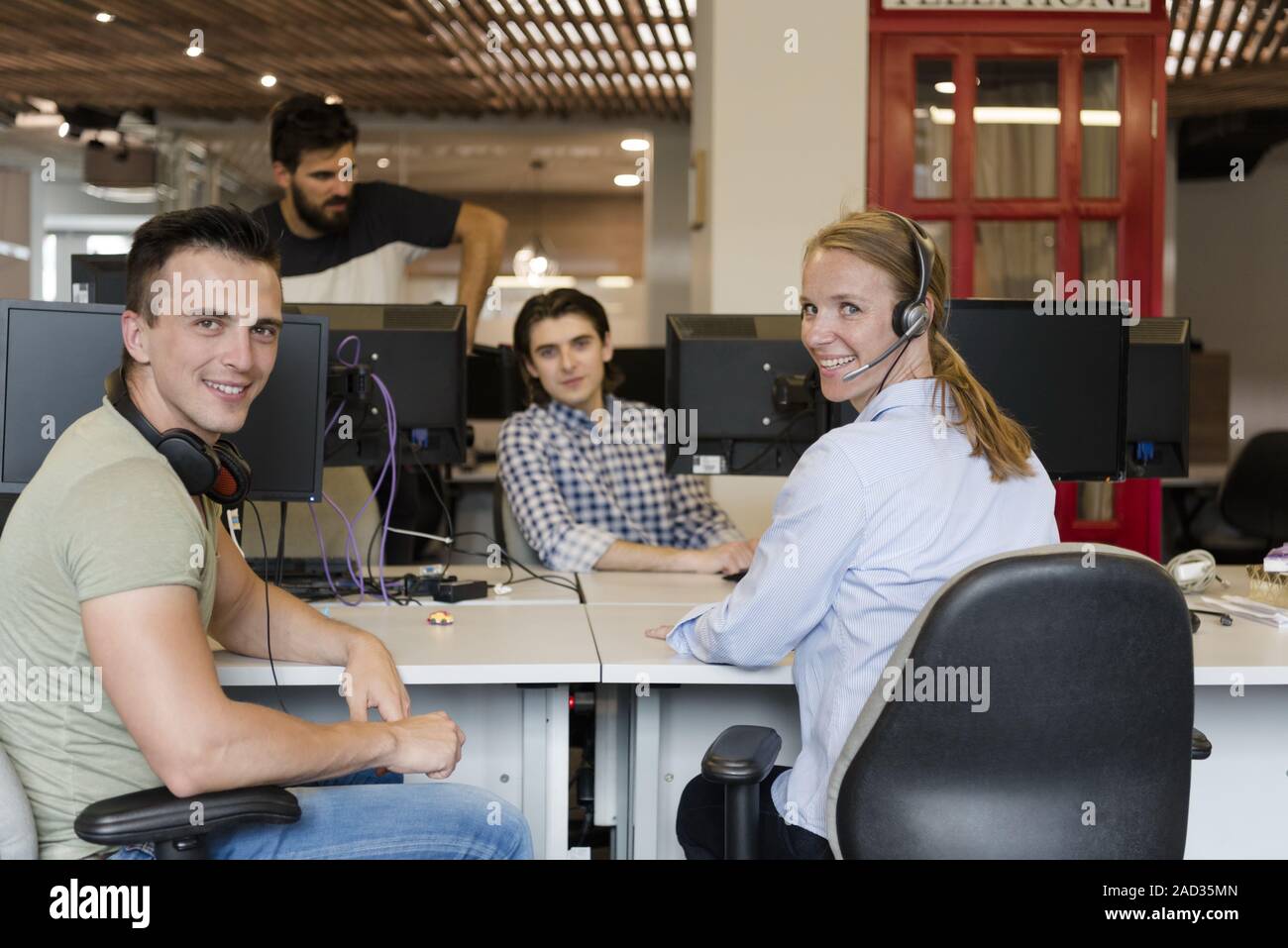 Colleagues getting together teamwork hi-res stock photography and ...