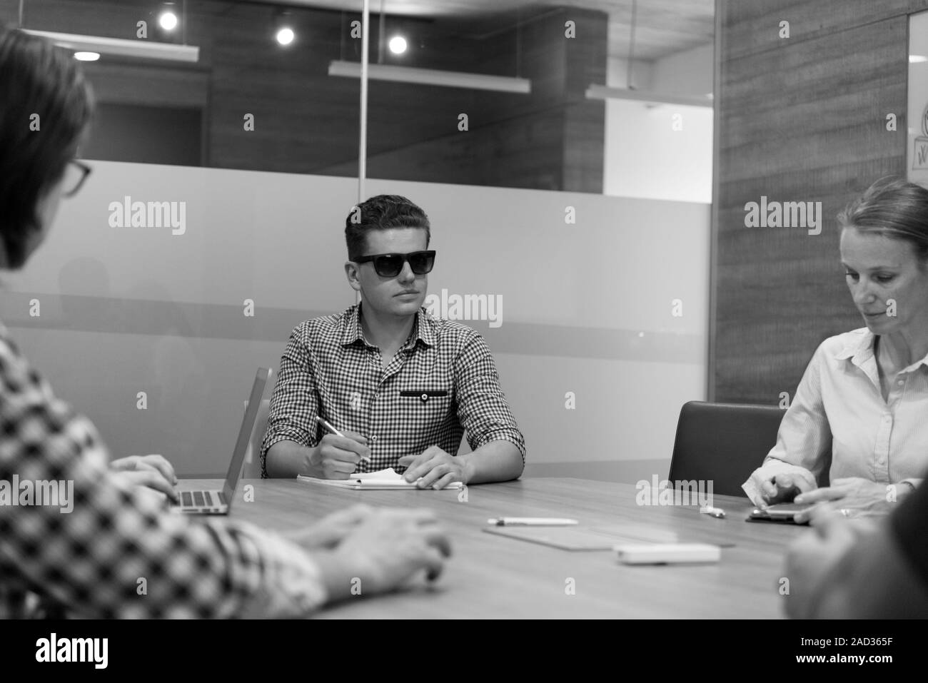 Business meeting tablet office Black and White Stock Photos & Images ...